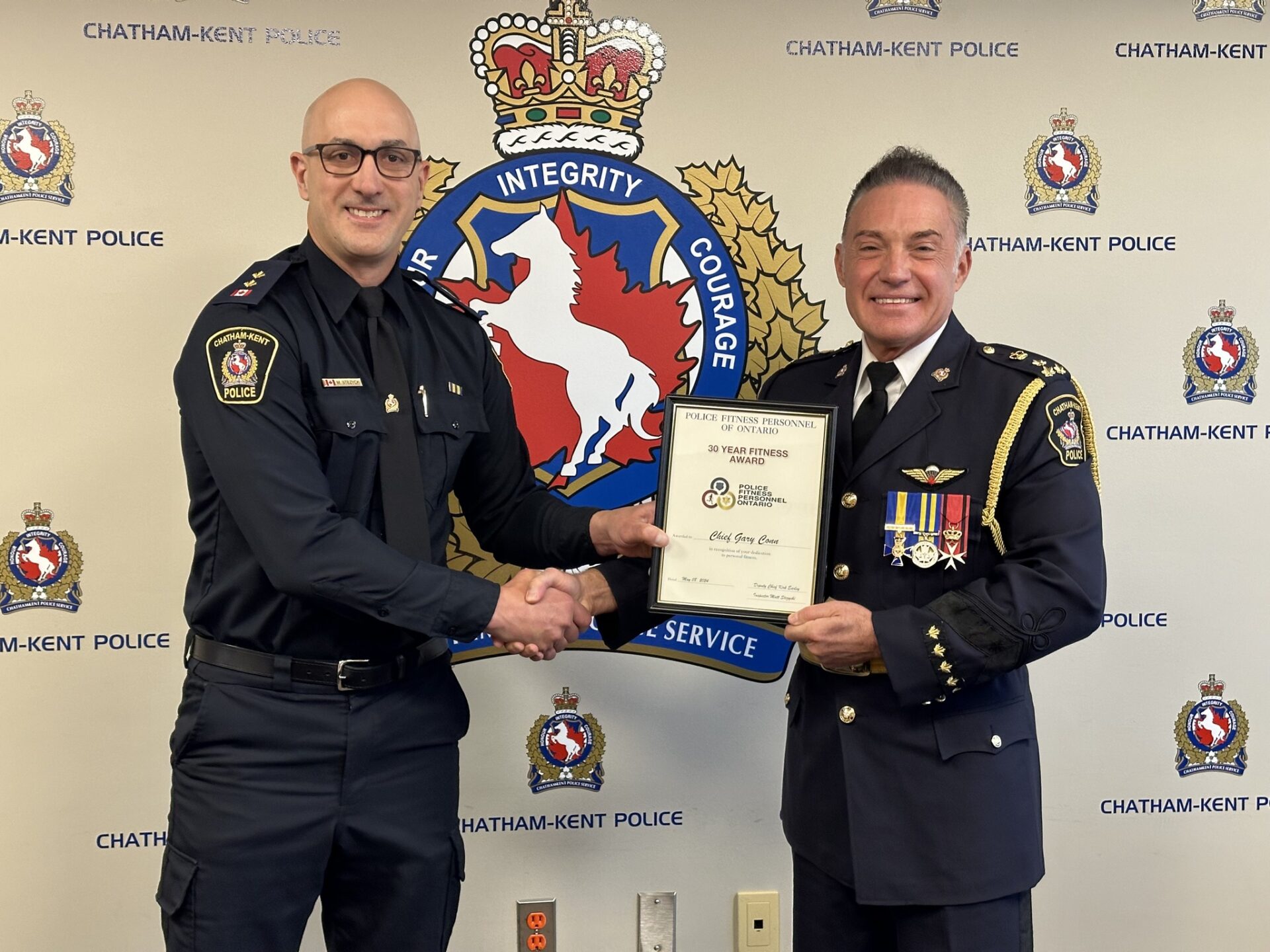 Police Chief Gary Conn receives 30-year fitness pin | Wallaceburg News ...